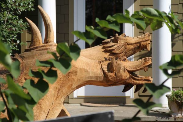 Felled Tree in Ashon Heights Repurposed as Dragon Sculpture | ARLnow.com