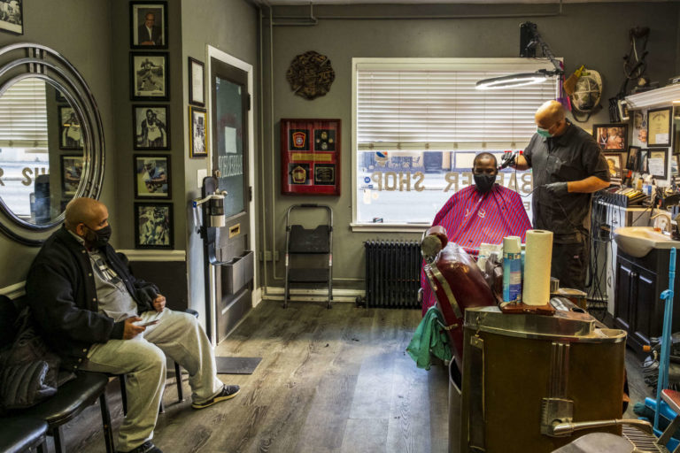 Arlington champions Moore’s Barber Shop as it charts new course for ...
