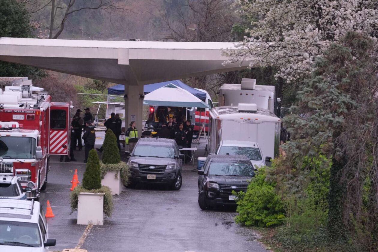 NEW: Massive police presence at former Key Bridge Marriott as county ...