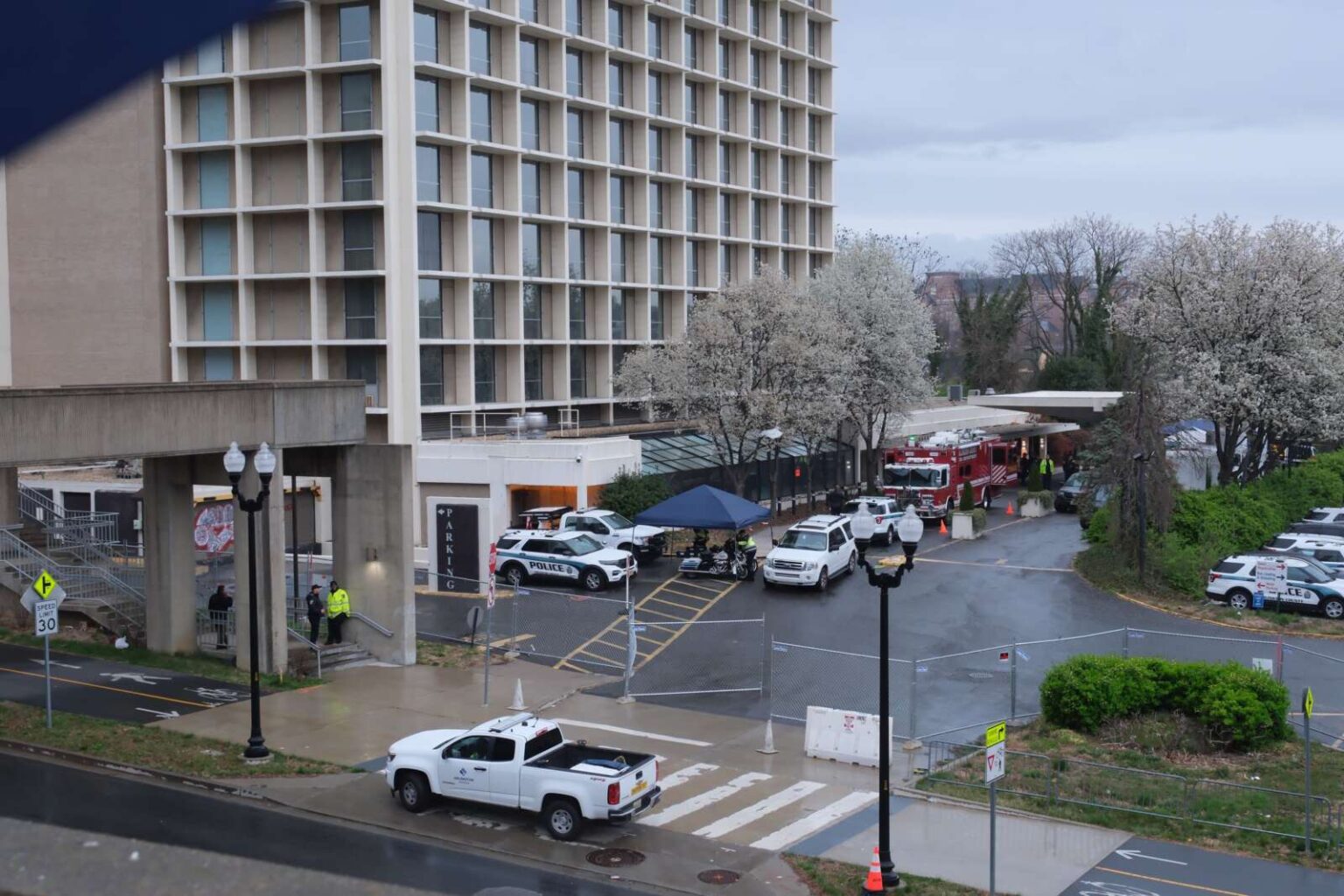 NEW: Massive police presence at former Key Bridge Marriott as county ...