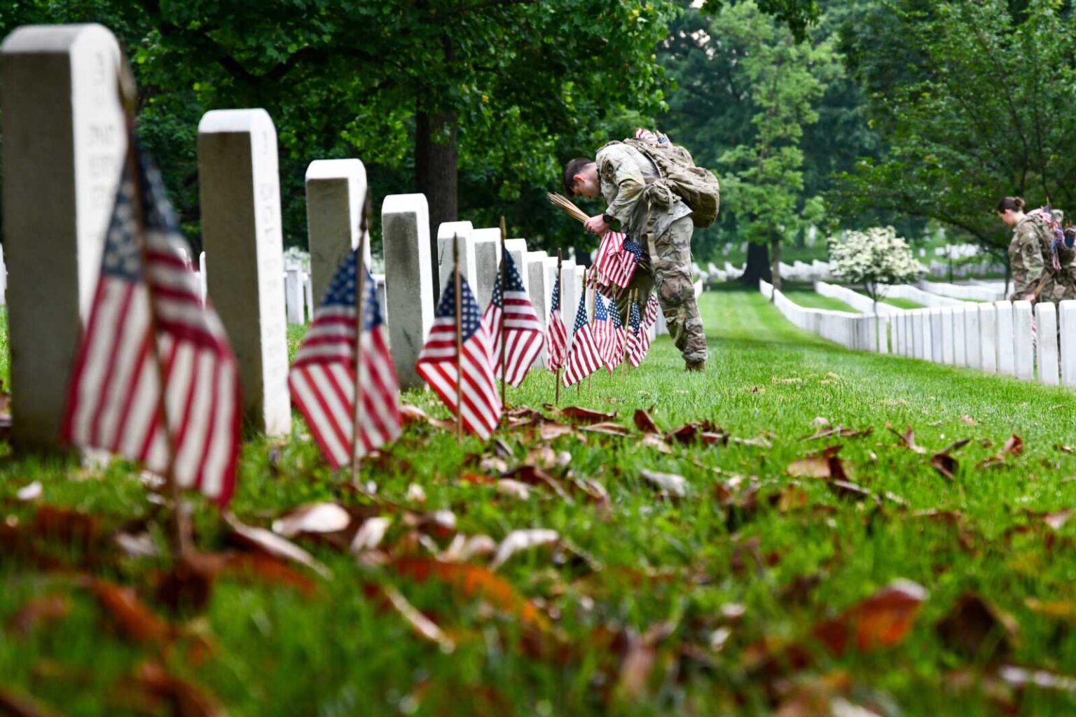 Photos: Soldiers honor fallen with 260,000 flags at Arlington National ...