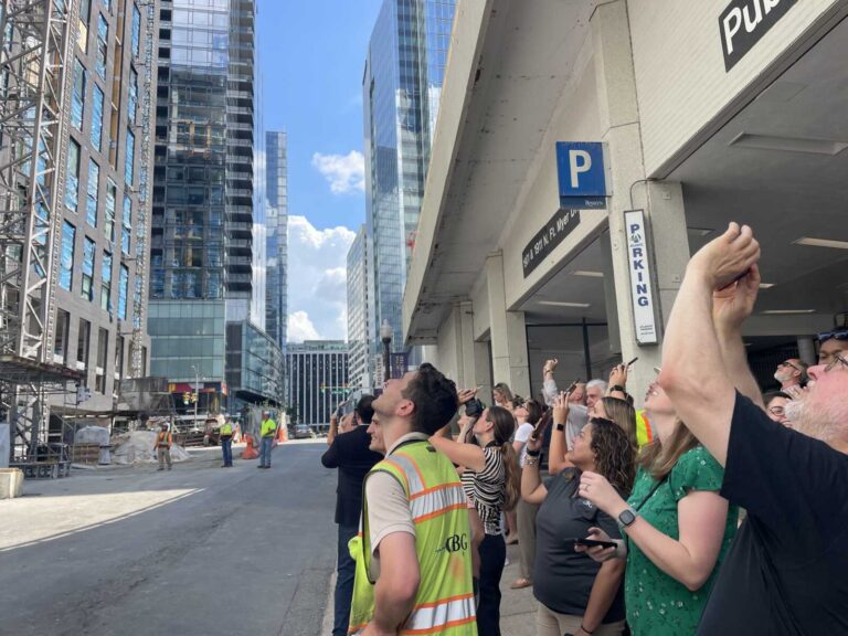 New 422-unit pair of apartment towers receives its final beam in ...