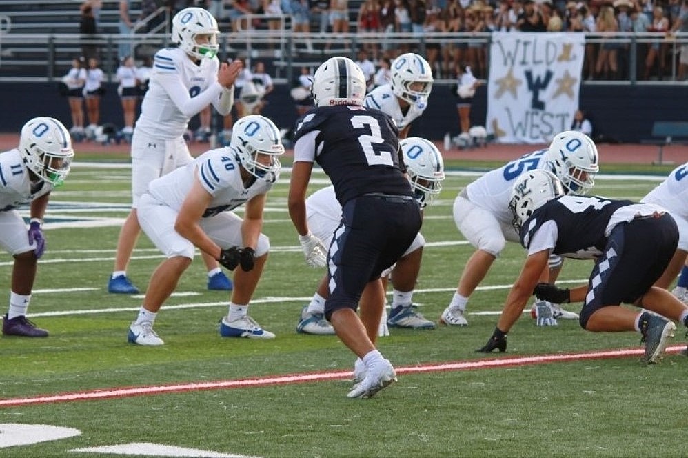 Quarterback play starts off strong for Arlington’s high-school football ...